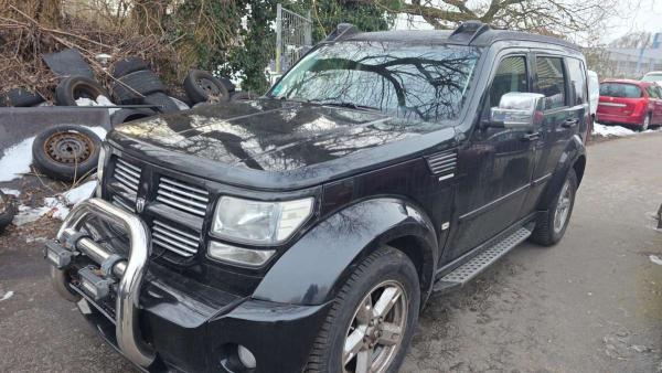 Black Dodge Nitro 2008 in Marijampole, with an engine capacity of 2.77 L and mileage of 225 thousand km for 4200 €, photo 1 on AUTOMOTO.COM.LV