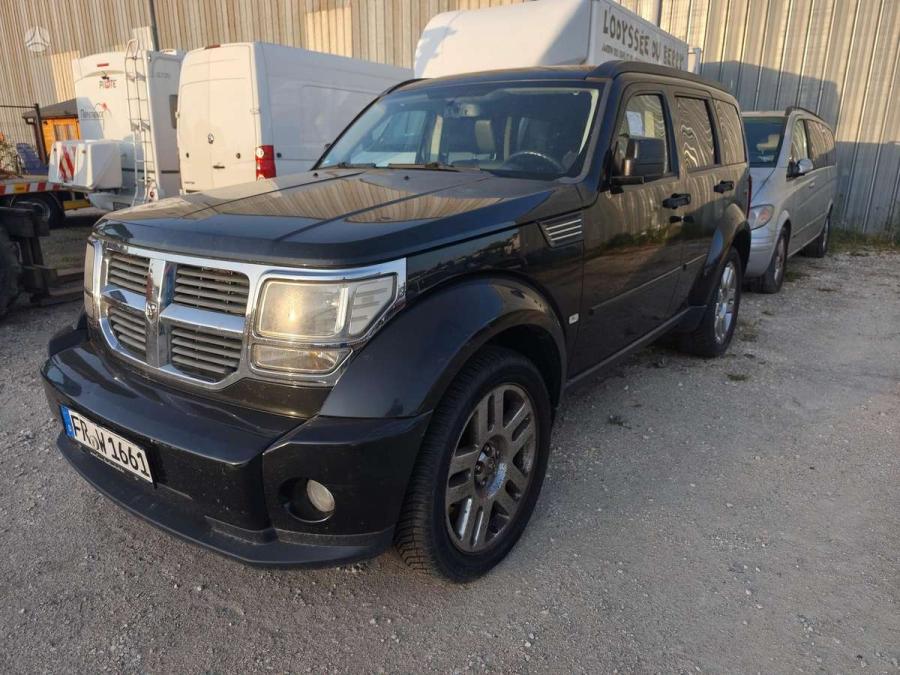 Melns Dodge Nitro 2009 Kauņa, ar dzinēja tilpumu 2.77 L un nobraukumu 240 tūkst. km par 1999 €, foto 1 vietnē AUTOMOTO.COM.LV