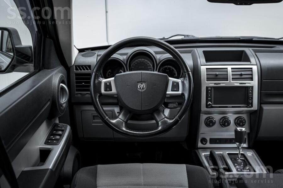 Grey Dodge Nitro 2009 in Riga, with an engine capacity of 2.80 L and mileage of 295 thousand km for 5990 €, photo 14 on AUTOMOTO.COM.LV