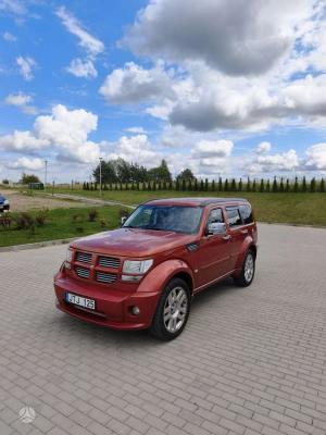 Oranžs Dodge Nitro 2008 Elektrėnai, ar dzinēja tilpumu 2.78 L un nobraukumu 201 tūkst. km par 3900 €, foto  vietnē AUTOMOTO.COM.LV