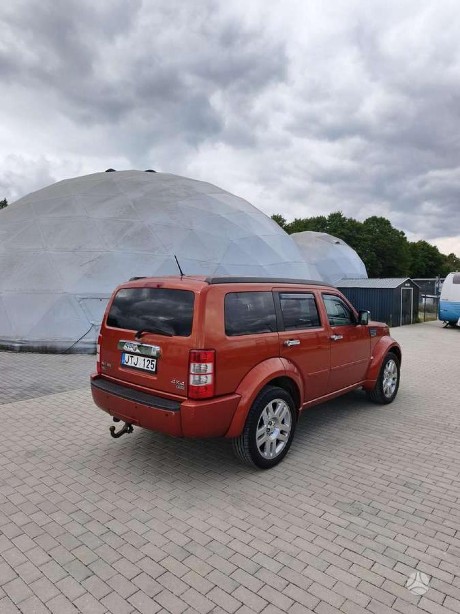 Oranžs Dodge Nitro 2008 Elektrėnai, ar dzinēja tilpumu 2.78 L un nobraukumu 201 tūkst. km par 3900 €, foto 4 vietnē AUTOMOTO.COM.LV
