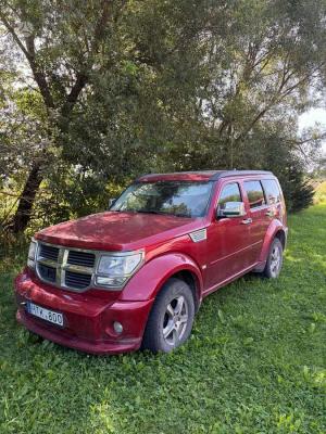 Red Dodge Nitro 2007 in Kaunas, with an engine capacity of 2.77 L and mileage of 390 thousand km for 999 €, photo  on AUTOMOTO.COM.LV