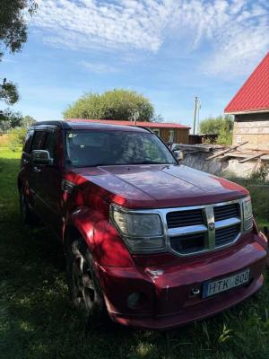 Red Dodge Nitro 2007 in Kaunas, with an engine capacity of 2.77 L and mileage of 390 thousand km for 999 €, photo 3 on AUTOMOTO.COM.LV