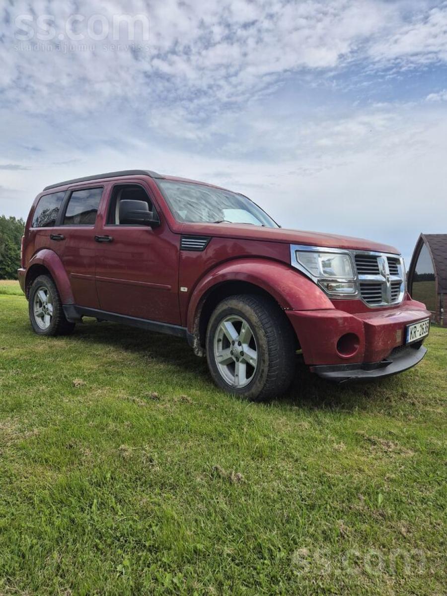 Red Dodge Nitro 2007 in Riga, with an engine capacity of 2.80 L and mileage of 0 thousand km for 2850 €, photo 1 on AUTOMOTO.COM.LV