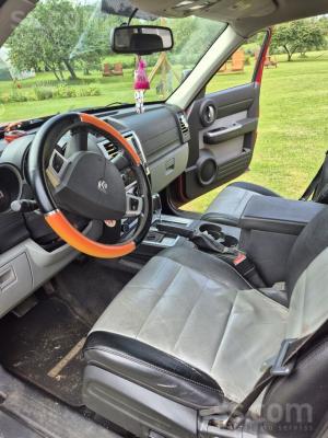 Red Dodge Nitro 2007 in Riga, with an engine capacity of 2.80 L and mileage of 0 thousand km for 2850 €, photo 4 on AUTOMOTO.COM.LV