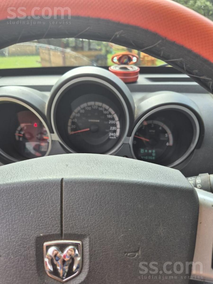 Red Dodge Nitro 2007 in Riga, with an engine capacity of 2.80 L and mileage of 0 thousand km for 2850 €, photo 9 on AUTOMOTO.COM.LV