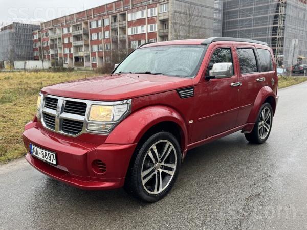 Red Dodge Nitro 2008 in Riga, with an engine capacity of 2.80 L and mileage of 316 thousand km for 3850 €, photo 1 on AUTOMOTO.COM.LV