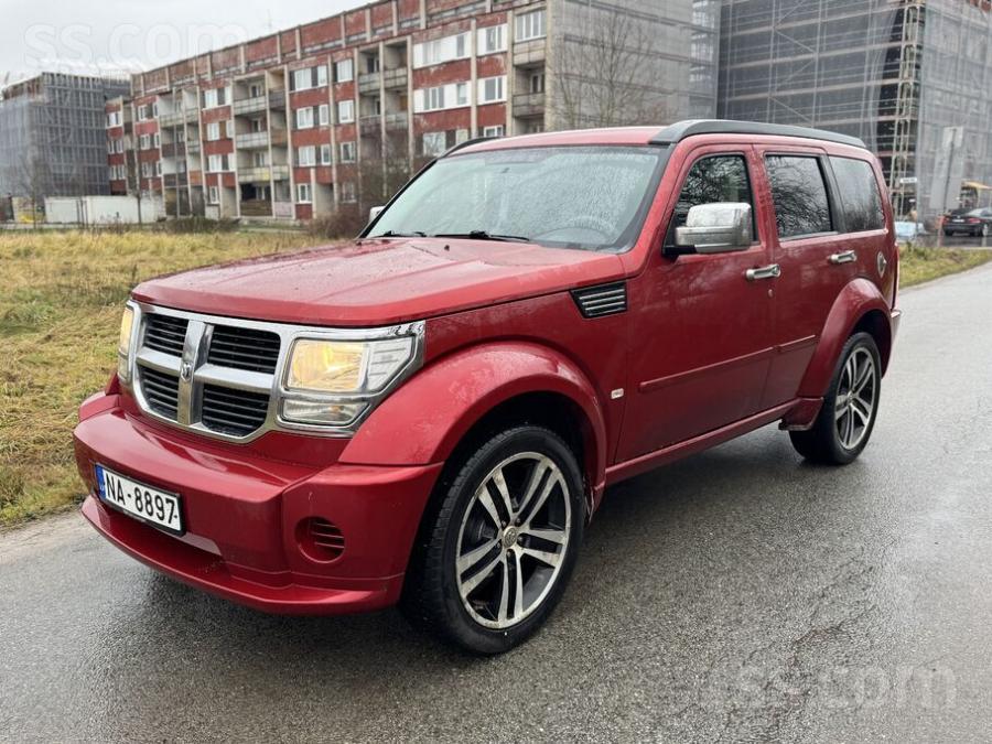 Red Dodge Nitro 2008 in Riga, with an engine capacity of 2.80 L and mileage of 316 thousand km for 3850 €, photo 1 on AUTOMOTO.COM.LV