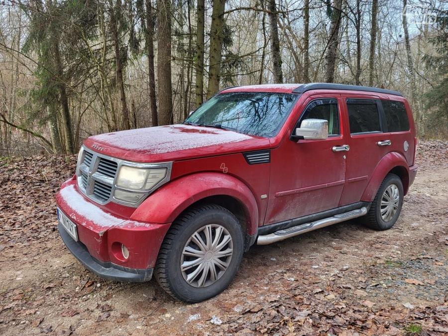 Red Dodge Nitro 2008 in Vilnius, with an engine capacity of 2.80 L and mileage of 260 thousand km for 2222 €, photo 1 on AUTOMOTO.COM.LV