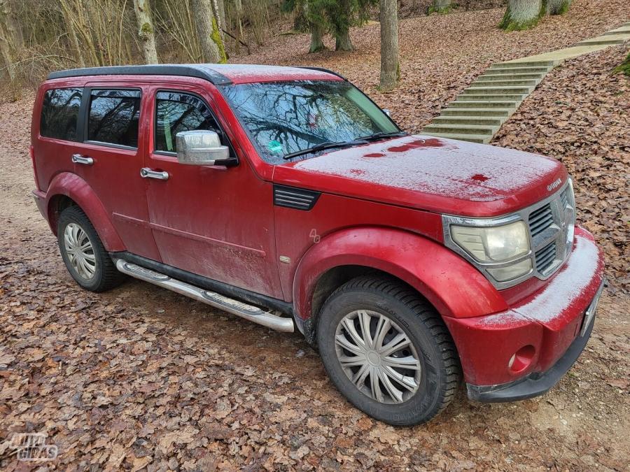 Red Dodge Nitro 2008 in Vilnius, with an engine capacity of 2.80 L and mileage of 260 thousand km for 2222 €, photo 3 on AUTOMOTO.COM.LV
