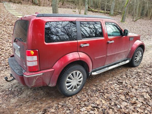 Red Dodge Nitro 2008 in Vilnius, with an engine capacity of 2.80 L and mileage of 260 thousand km for 2222 €, photo 3 on AUTOMOTO.COM.LV