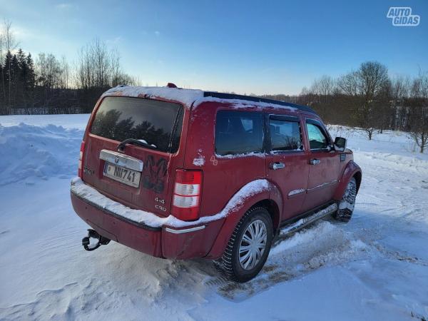 Red Dodge Nitro 2008 in Vilnius, with an engine capacity of 2.80 L and mileage of 260 thousand km for 2222 €, photo 10 on AUTOMOTO.COM.LV