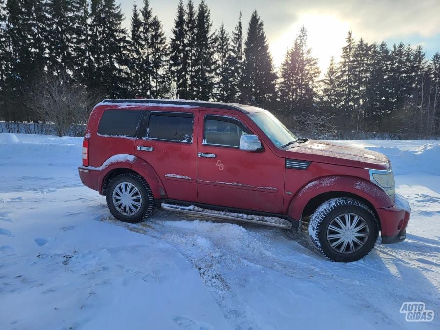Red Dodge Nitro 2008 in Vilnius, with an engine capacity of 2.80 L and mileage of 260 thousand km for 2222 €, photo 14 on AUTOMOTO.COM.LV