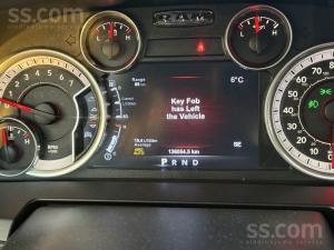 Black Dodge RAM 2015 in Riga, with an engine capacity of 5.70 L and mileage of 135 thousand km for 31900 €, photo 12 on AUTOMOTO.COM.LV