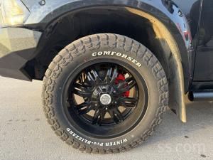 Black Dodge RAM 2015 in Riga, with an engine capacity of 5.70 L and mileage of 135 thousand km for 31900 €, photo 15 on AUTOMOTO.COM.LV