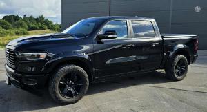 Black Dodge RAM 2020 in Plunge, with an engine capacity of 5.70 L and mileage of 59 thousand km for 45375 €, photo 11 on AUTOMOTO.COM.LV