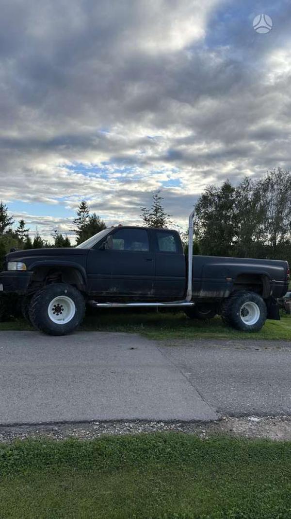 Dodge RAM 1996 Pasvalys vietnÄ Melns Dodge RAM 1996 Pasvalys, ar dzinÄja tilpumu 8.00 L un nobraukumu 354 tÅ«kst. km par 8000 ā¬, foto 3 vietnÄ AUTOMOTO.COM.LV