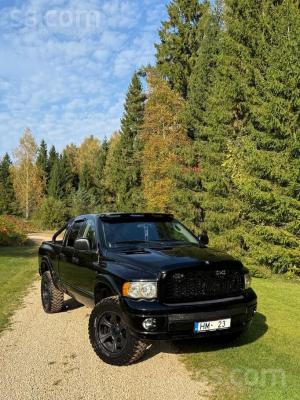 Black Dodge RAM 2002 in Riga, with an engine capacity of 4.70 L and mileage of 250 thousand km for 8995 €, photo  on AUTOMOTO.COM.LV