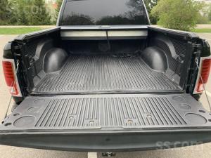 Black Dodge RAM 2013 in Liepaja, with an engine capacity of 5.70 L and mileage of 305 thousand km for 20350 €, photo 7 on AUTOMOTO.COM.LV