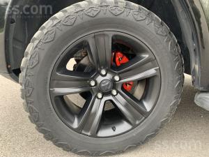 Black Dodge RAM 2013 in Liepaja, with an engine capacity of 5.70 L and mileage of 305 thousand km for 20350 €, photo 14 on AUTOMOTO.COM.LV