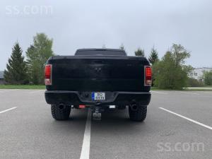 Black Dodge RAM 2013 in Liepaja, with an engine capacity of 5.70 L and mileage of 305 thousand km for 20350 €, photo 16 on AUTOMOTO.COM.LV