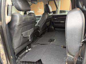 Black Dodge RAM 2015 in Riga, with an engine capacity of 3.00 L and mileage of 246 thousand km for 23900 €, photo 21 on AUTOMOTO.COM.LV