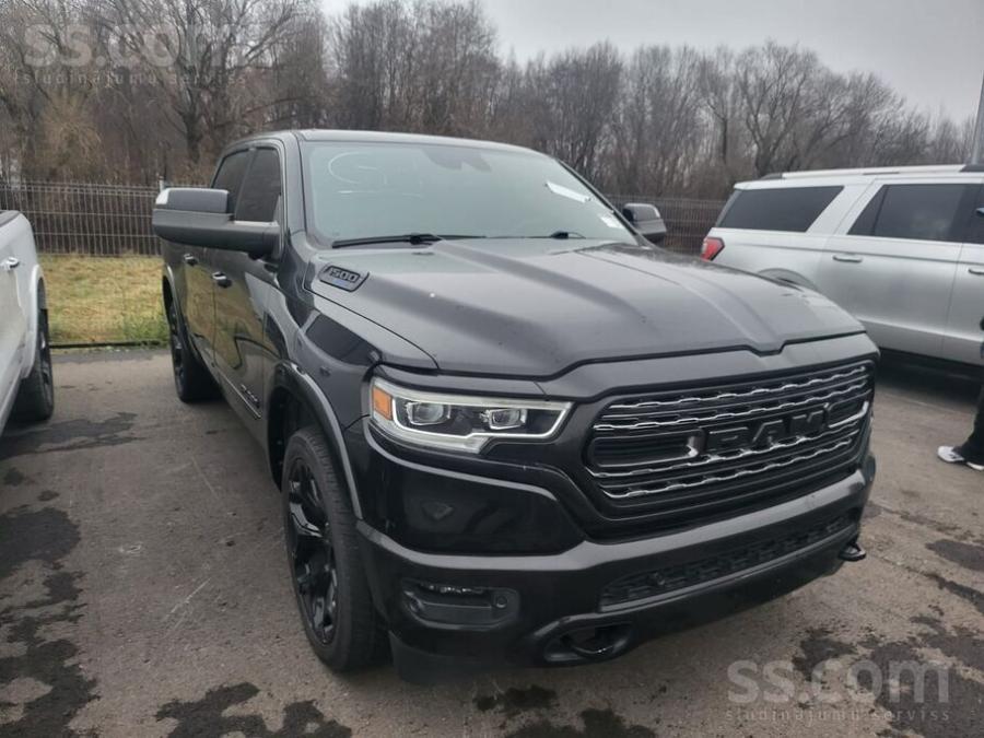 Black Dodge RAM 2021 in Riga, with an engine capacity of 5.70 L and mileage of 125 thousand km for 51000 €, photo 1 on AUTOMOTO.COM.LV