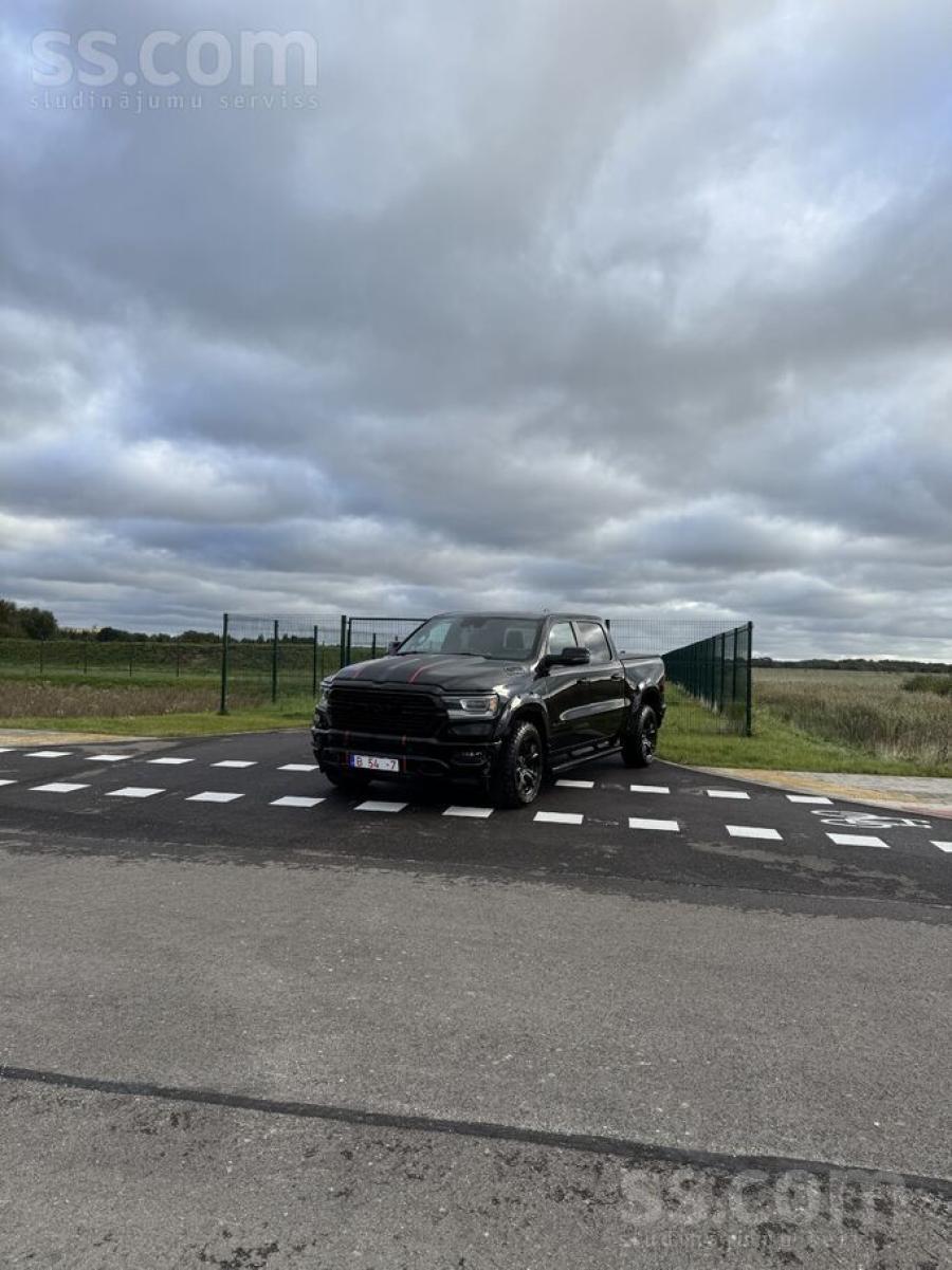 Black Dodge RAM 2023 in Liepaja, with an engine capacity of 5.70 L and mileage of 73 thousand km for 49900 €, photo 3 on AUTOMOTO.COM.LV