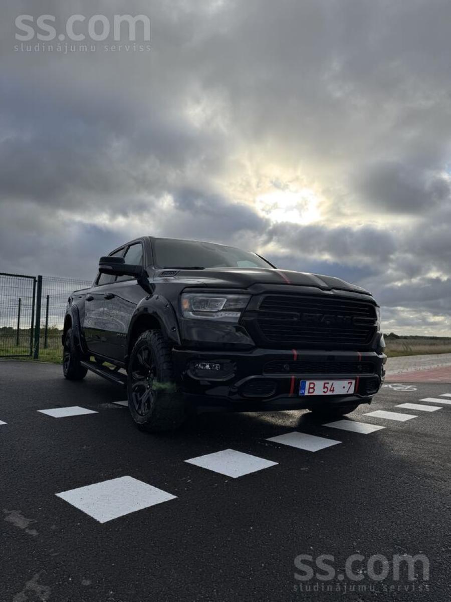 Black Dodge RAM 2023 in Liepaja, with an engine capacity of 5.70 L and mileage of 73 thousand km for 49900 €, photo 4 on AUTOMOTO.COM.LV