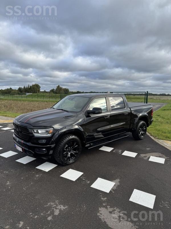 Black Dodge RAM 2023 in Liepaja, with an engine capacity of 5.70 L and mileage of 73 thousand km for 49900 €, photo 6 on AUTOMOTO.COM.LV