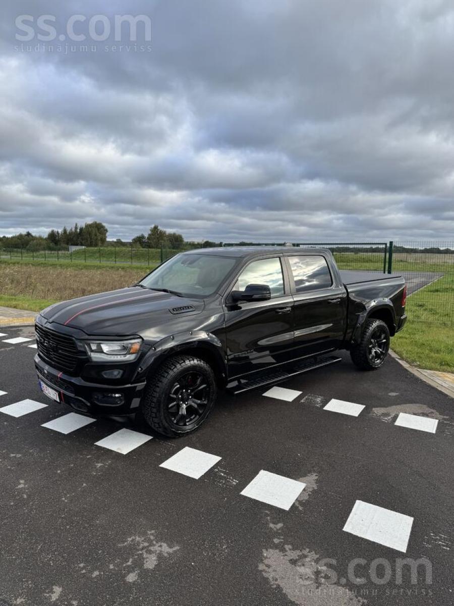 Black Dodge RAM 2023 in Liepaja, with an engine capacity of 5.70 L and mileage of 73 thousand km for 49900 €, photo 6 on AUTOMOTO.COM.LV