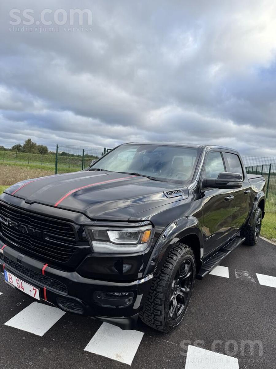Black Dodge RAM 2023 in Liepaja, with an engine capacity of 5.70 L and mileage of 73 thousand km for 49900 €, photo 12 on AUTOMOTO.COM.LV