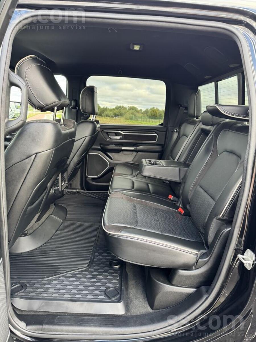Black Dodge RAM 2023 in Liepaja, with an engine capacity of 5.70 L and mileage of 73 thousand km for 49900 €, photo 20 on AUTOMOTO.COM.LV