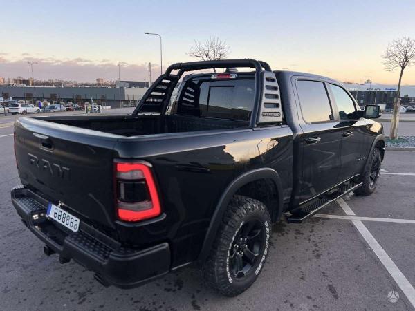 Black Dodge RAM 2024 in Kaunas, with an engine capacity of 5.70 L and mileage of 12 thousand km for 54999 €, photo 2 on AUTOMOTO.COM.LV