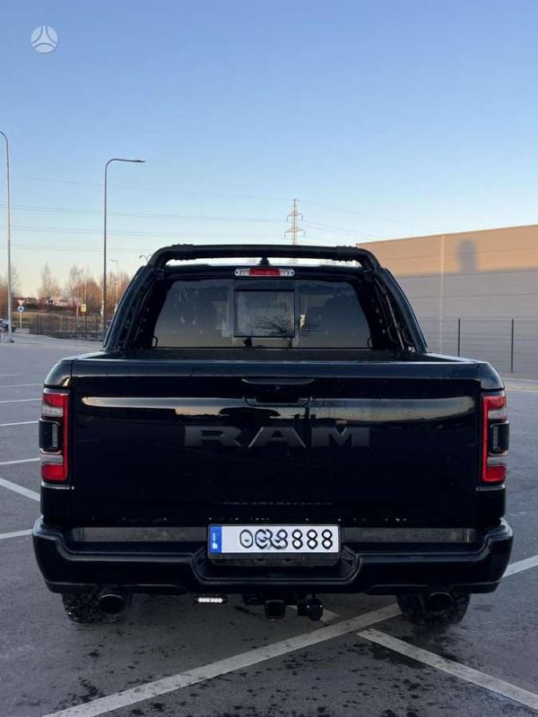 Black Dodge RAM 2024 in Kaunas, with an engine capacity of 5.70 L and mileage of 12 thousand km for 54999 €, photo 5 on AUTOMOTO.COM.LV