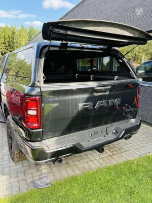 Black Dodge RAM 2025 in Plunge, with an engine capacity of 3.00 L and mileage of 19 thousand km for 14400 €, photo 21 on AUTOMOTO.COM.LV