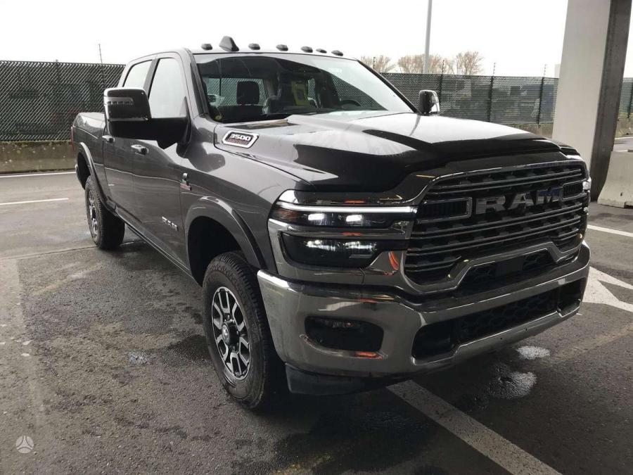 Black Dodge RAM 2026 in Plunge, with an engine capacity of 6.69 L and mileage of 0 thousand km for 51000 €, photo 1 on AUTOMOTO.COM.LV