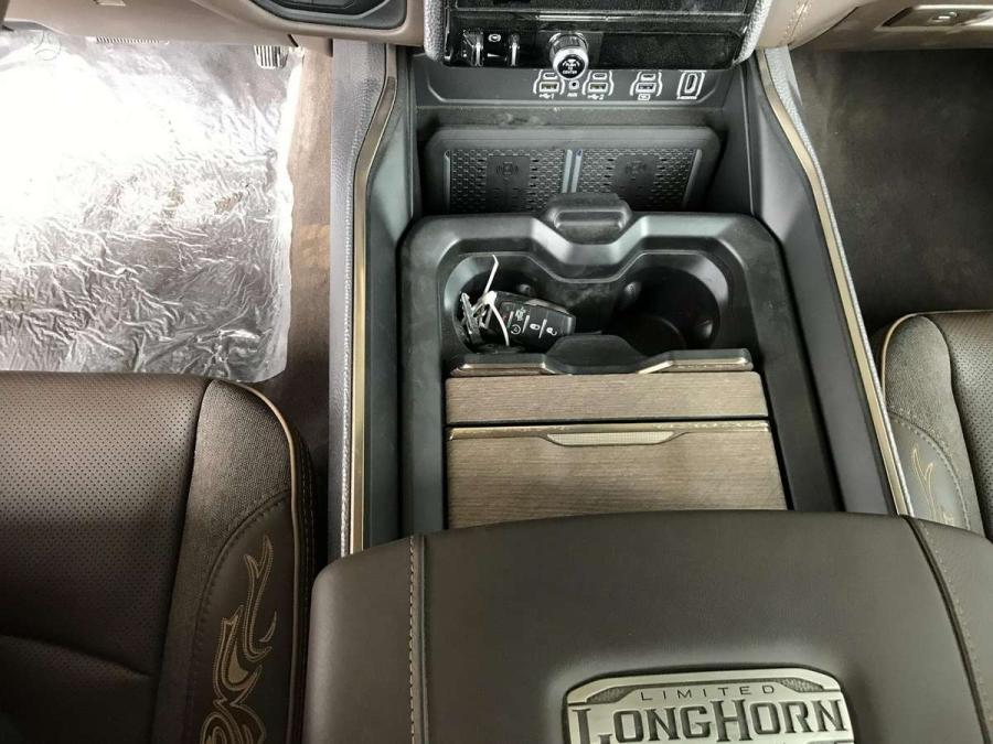 Black Dodge RAM 2026 in Plunge, with an engine capacity of 6.69 L and mileage of 0 thousand km for 51000 €, photo 19 on AUTOMOTO.COM.LV