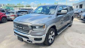 Grey Dodge RAM 2021 in Ukmerge, with an engine capacity of 5.70 L and mileage of 85 thousand km for 22999 €, photo 5 on AUTOMOTO.COM.LV