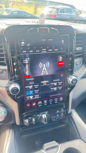 Grey Dodge RAM 2021 in Ukmerge, with an engine capacity of 5.70 L and mileage of 85 thousand km for 22999 €, photo 17 on AUTOMOTO.COM.LV