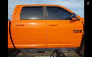 Orange Dodge RAM 2015 in Siauliai, with an engine capacity of 5.65 L and mileage of 232 thousand km for 10000 €, photo 11 on AUTOMOTO.COM.LV