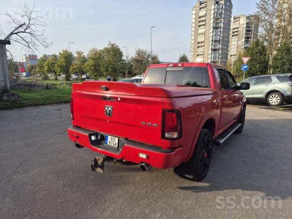Red Dodge RAM 2015 in Riga, with an engine capacity of 5.70 L and mileage of 238 thousand km for 25990 €, photo 7 on AUTOMOTO.COM.LV