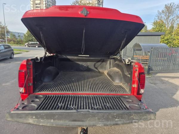 Red Dodge RAM 2015 in Riga, with an engine capacity of 5.70 L and mileage of 238 thousand km for 25990 €, photo 9 on AUTOMOTO.COM.LV