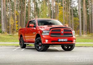 Red Dodge RAM 2015 in Riga, with an engine capacity of 5.70 L and mileage of 238 thousand km for 25990 €, photo 3 on AUTOMOTO.COM.LV