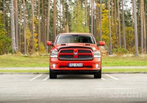 Red Dodge RAM 2015 in Riga, with an engine capacity of 5.70 L and mileage of 238 thousand km for 25990 €, photo 4 on AUTOMOTO.COM.LV