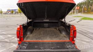 Red Dodge RAM 2015 in Riga, with an engine capacity of 5.70 L and mileage of 238 thousand km for 25990 €, photo 33 on AUTOMOTO.COM.LV