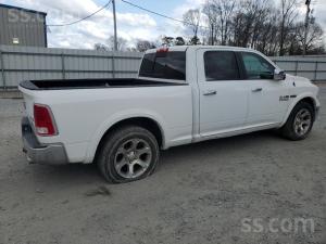 White Dodge RAM 2014 in Riga, with an engine capacity of 3.00 L and mileage of 144 thousand km for 9900 €, photo 5 on AUTOMOTO.COM.LV