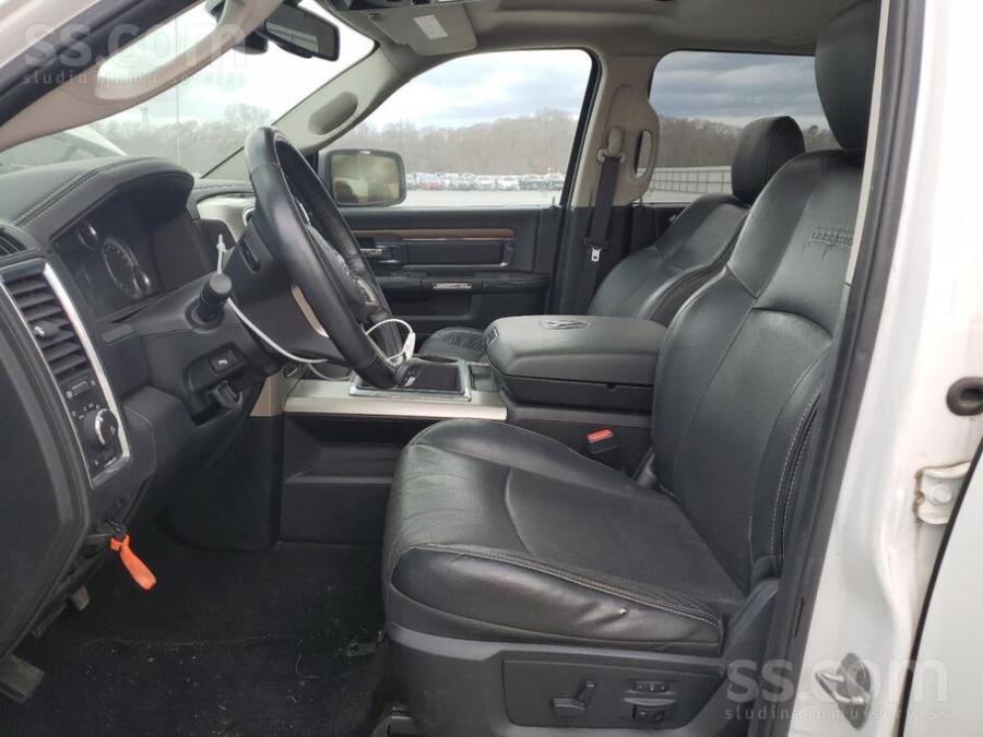 White Dodge RAM 2014 in Riga, with an engine capacity of 3.00 L and mileage of 144 thousand km for 9900 €, photo 9 on AUTOMOTO.COM.LV