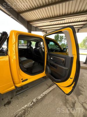 Yellow Dodge RAM 2016 in Riga, with an engine capacity of 5.70 L and mileage of 185 thousand km for 34200 €, photo 10 on AUTOMOTO.COM.LV