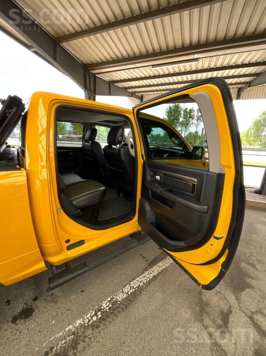 Yellow Dodge RAM 2016 in Riga, with an engine capacity of 5.70 L and mileage of 185 thousand km for 34200 €, photo 10 on AUTOMOTO.COM.LV